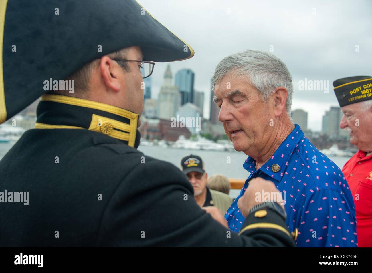 BOSTON (August 20, 2021) Lt. Cmdr. Andrew Broyles, executive officer of USS Constitution pins U ...