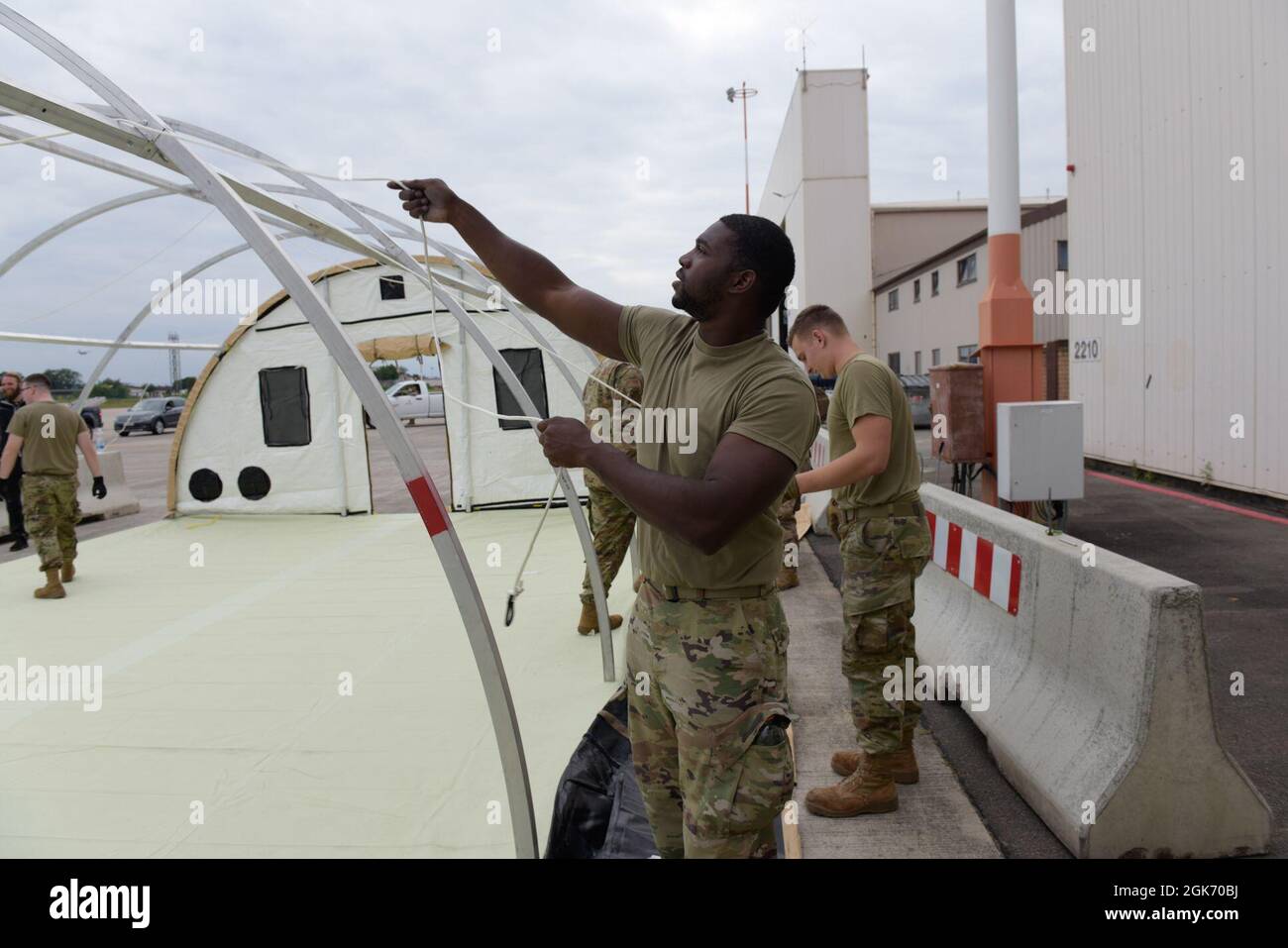 U.S. Air Force Airmen from the 786th Civil Engineering Squadron put up ...