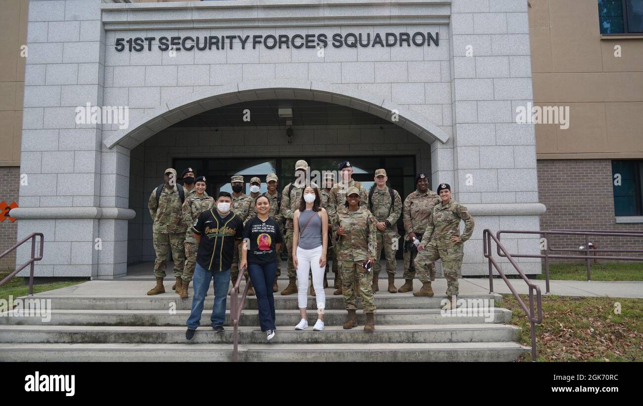 A group stands in front of the 51st Security Forces Squadron after ...