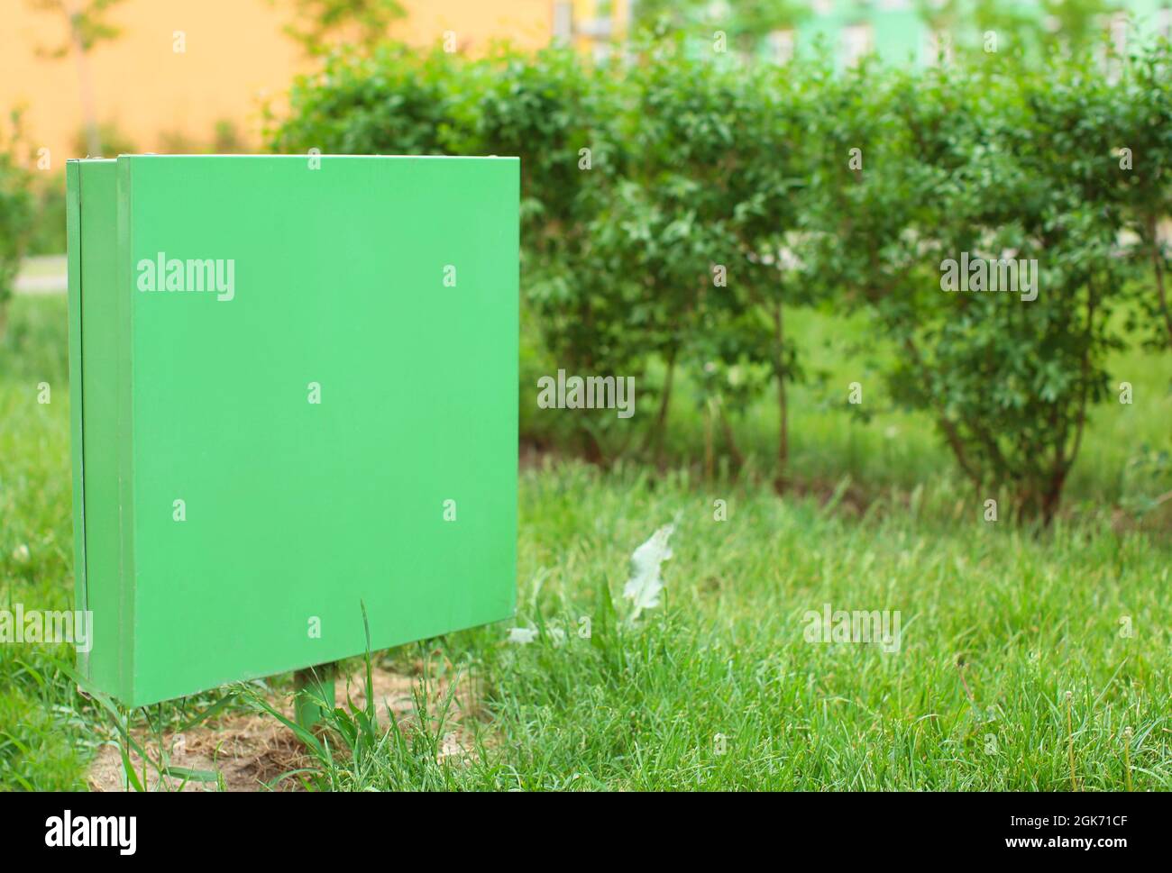 Empty sign board on lawn in park Stock Photo - Alamy