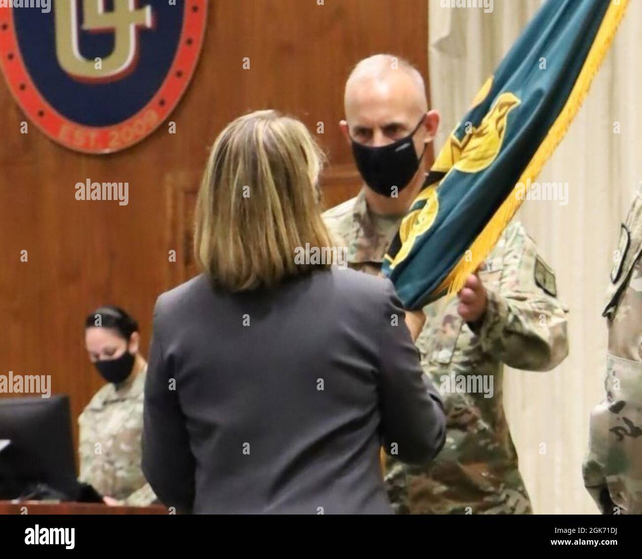 Col. Gregory K. Gibbons accepts the Army Logistics University colors ...