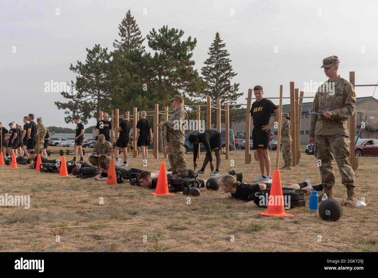 Soldiers assigned to 1-125 Field Artillery, perform sprint-drag-carry ...