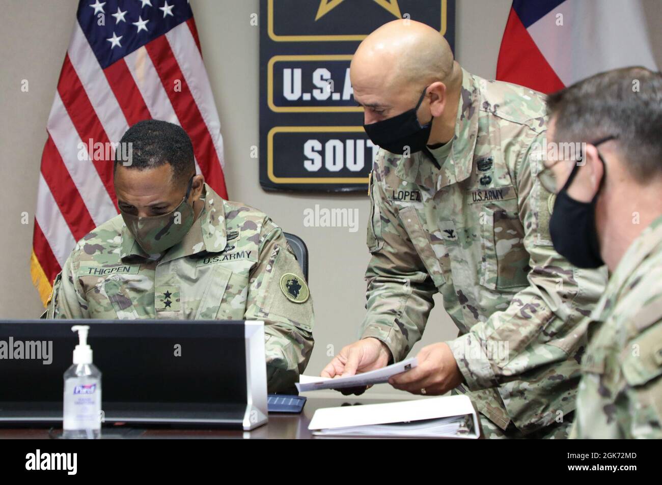 Maj. Gen. William L. Thigpen, left, U.S. Army South commanding general ...