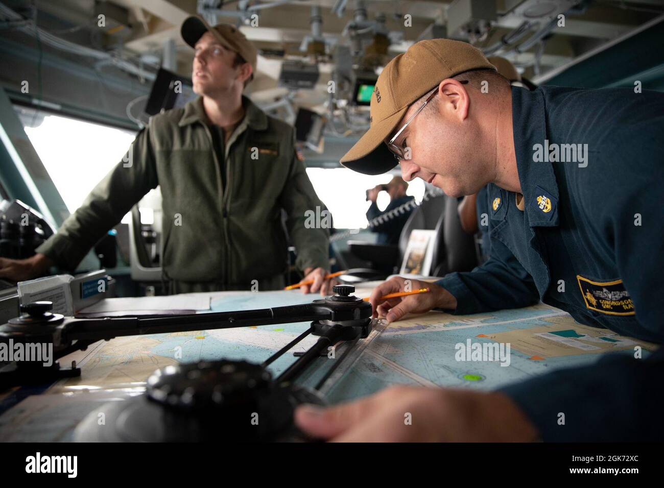 Chief Quartermaster Levi Osmondson, right, from Abbotsford, Wisconsin ...