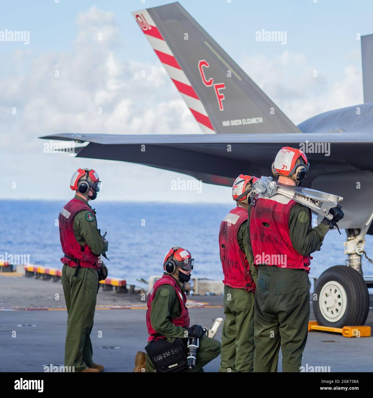 U.S. Marines with 31st Marine Expeditionary Unit (MEU), prepare to load ...