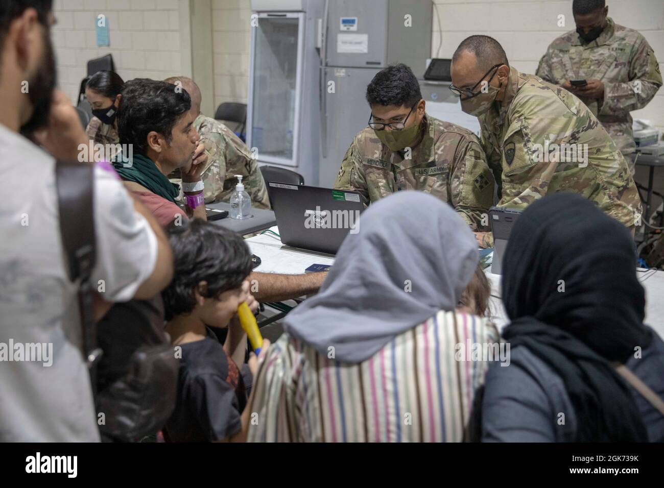 U.S. Army Spc. Jonathan Mendiola, a shower/laundry and clothing repair ...