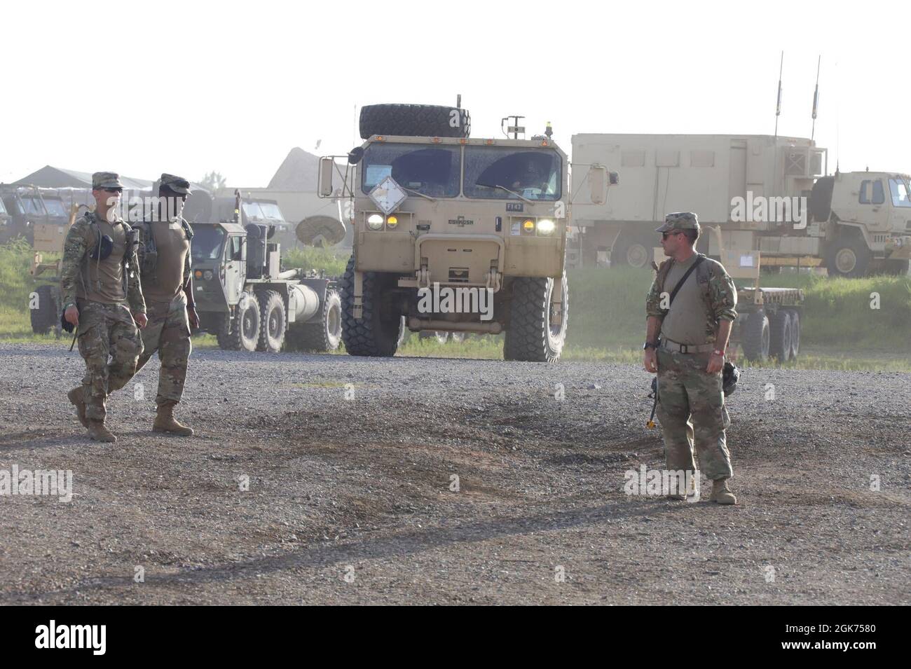 Soldiers move throughout their motor pool during Rotation 21-09 at the ...