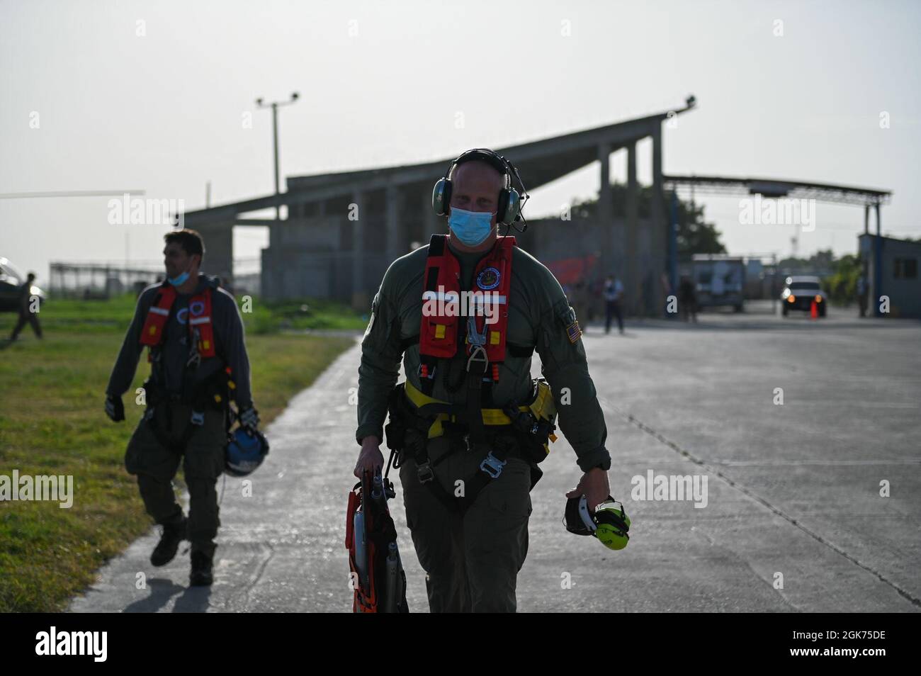 Petty Officer 3rd Class Nickolaus Trimpe, and Petty Officer 2nd Class ...