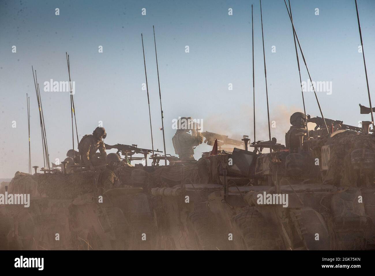 Australian Army soldiers with 1st Armored Regiment observes the rounds ...