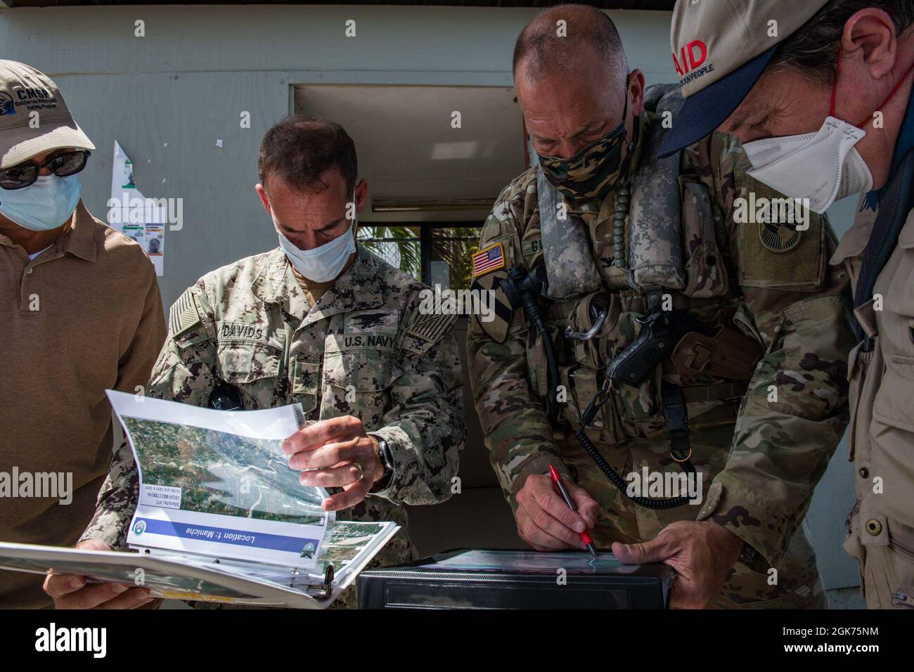 U.S. Navy Rear Adm. Keith Davids, left, commander of U.S. Southern ...