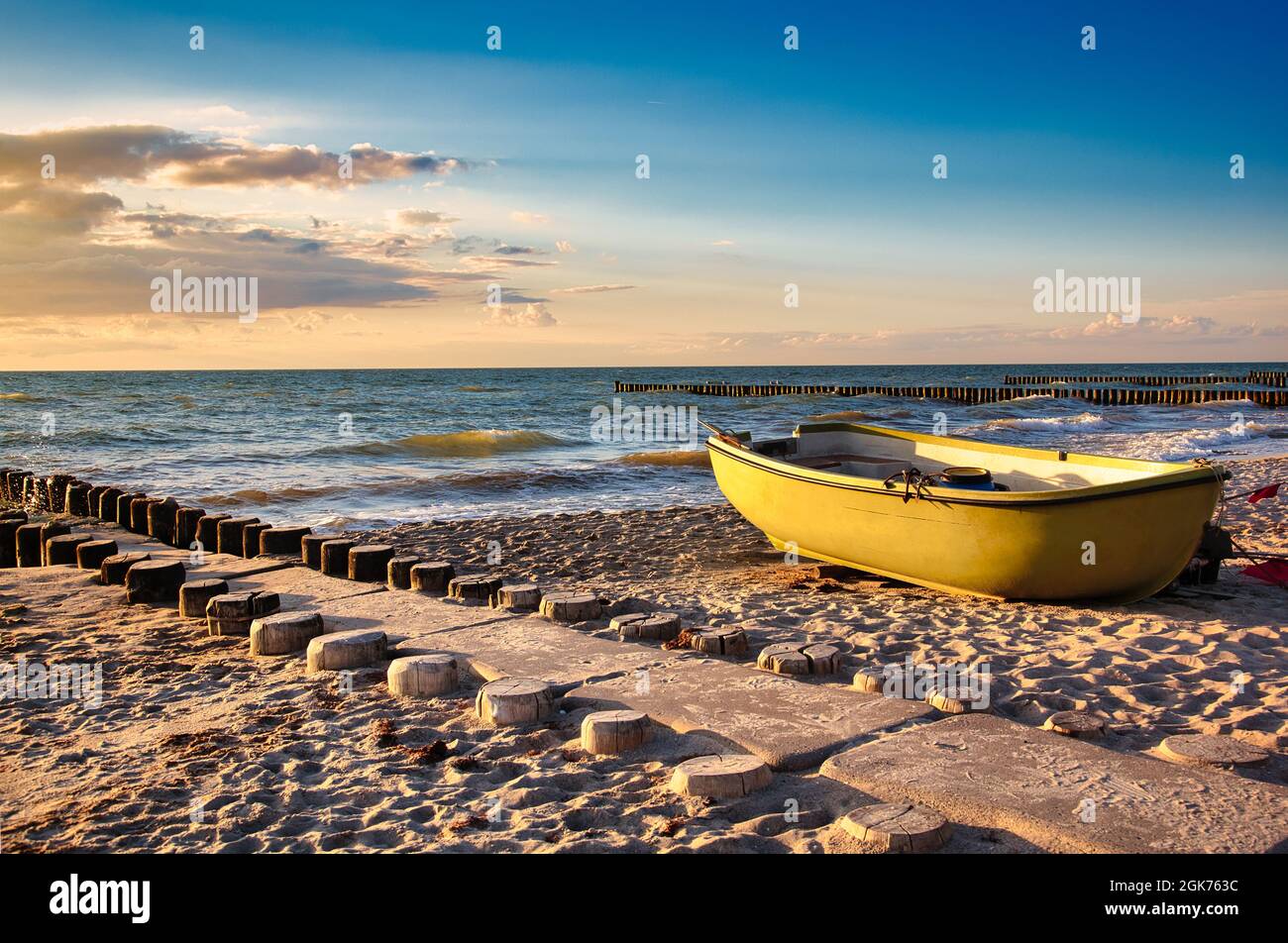Empty fishing boat on the beach Stock Photo - Alamy