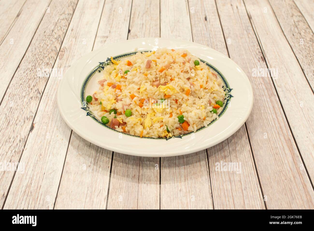 Three delights rice plate made with Chinese restaurant recipe, with ...