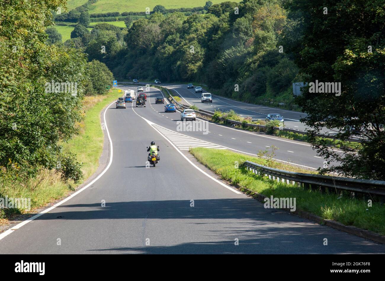 Devon, England, UK. 2021. Motorcyclist entering the A38 Devon ...