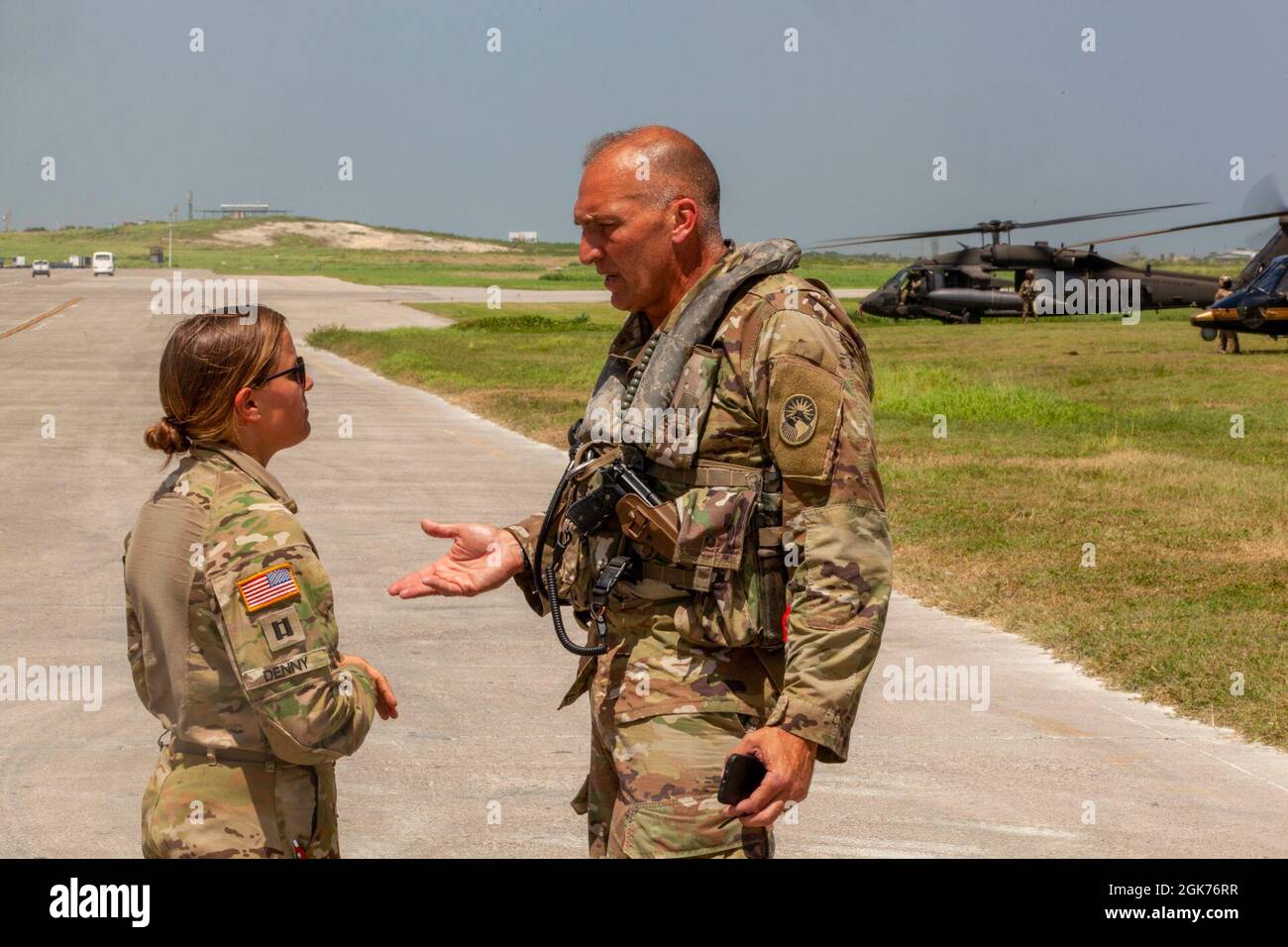 Col. Stephen Gventer, Commander of JTF-B, Talks to Cpt. Carolyn Denny at Port-au-Prince, Haiti ...