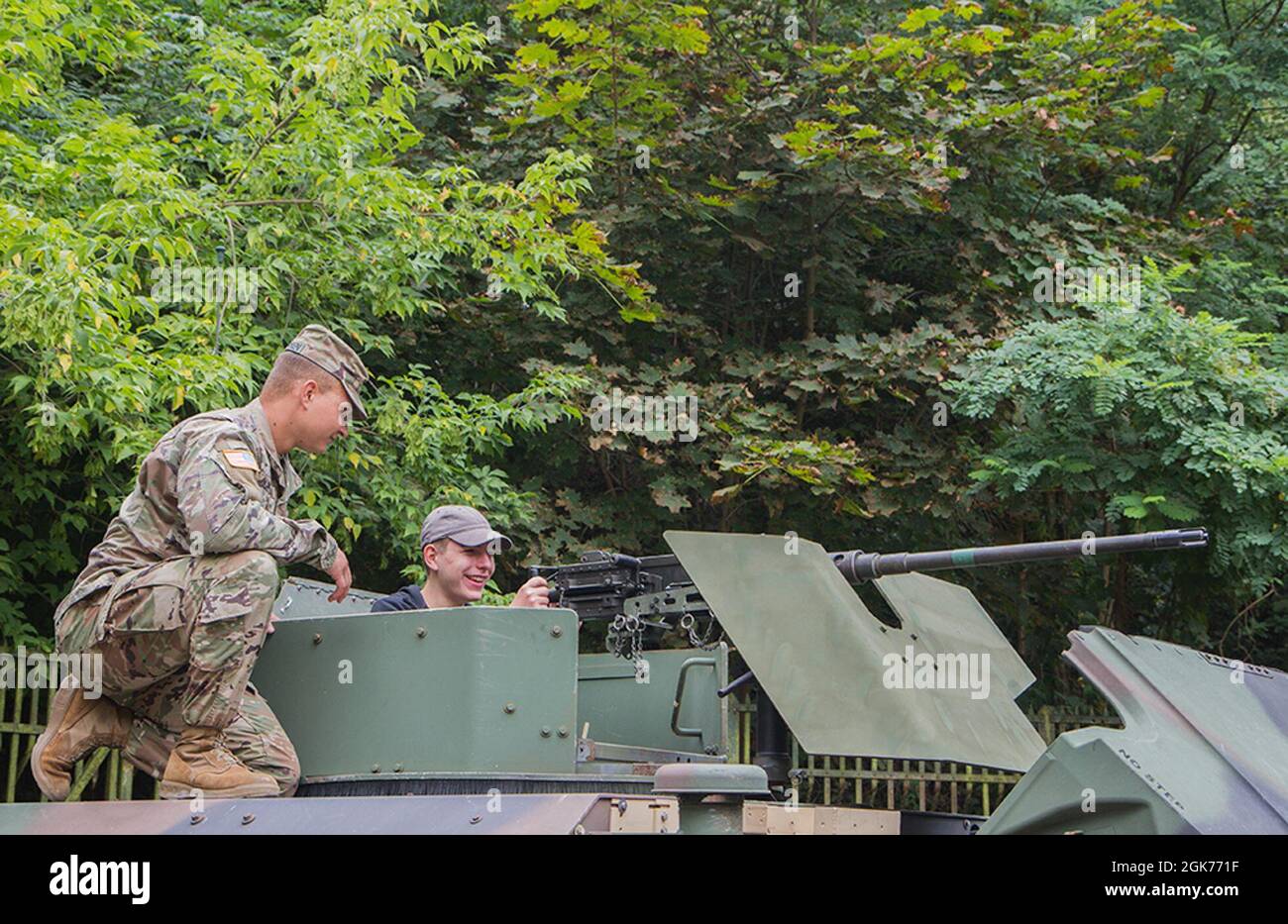 Army Sgt. Nevada Sorenson (left), a cannon crew member deployed with ...