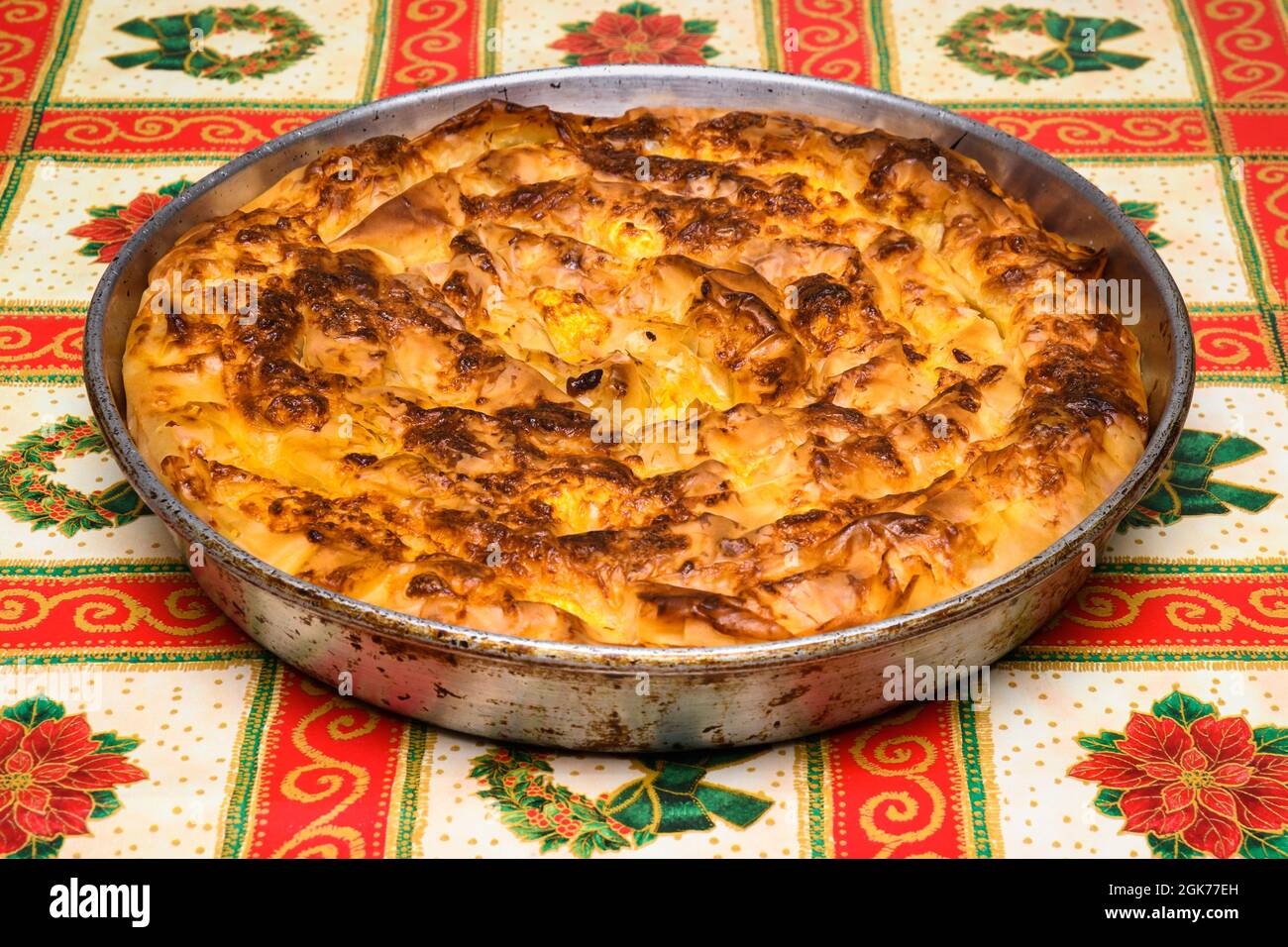 Homemade traditional swirl shaped Balkan pie (banitsa) with eggs and ...