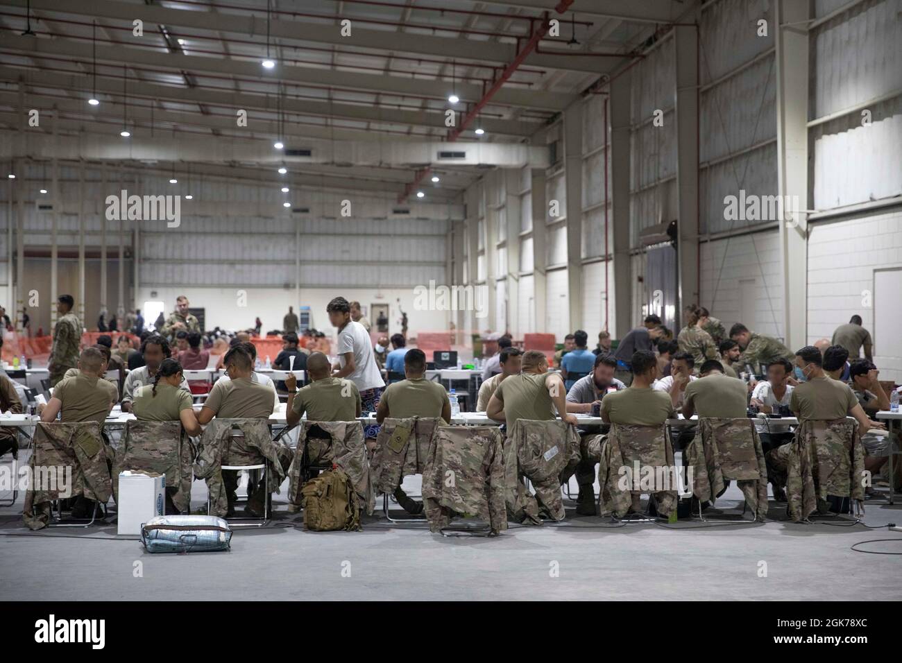U.S. Army Soldiers record Afghan evacuees’ biometrics during out ...