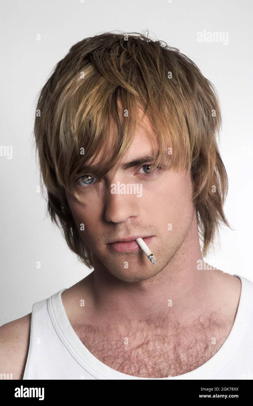 handsome male smoking Stock Photo - Alamy