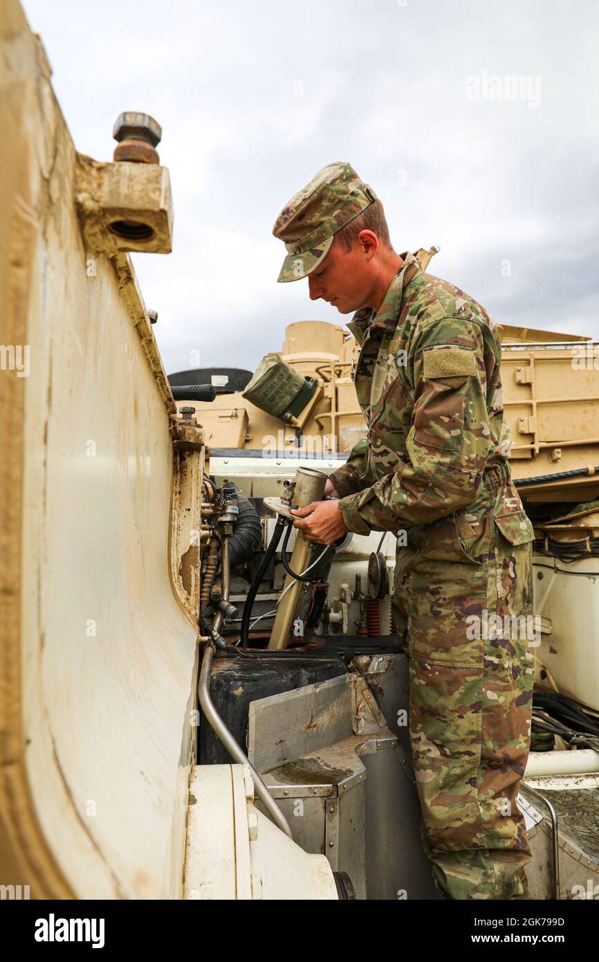 Pfc. Marshall Todd, an M1 Abrams Tank system maintainer with Alpha ...