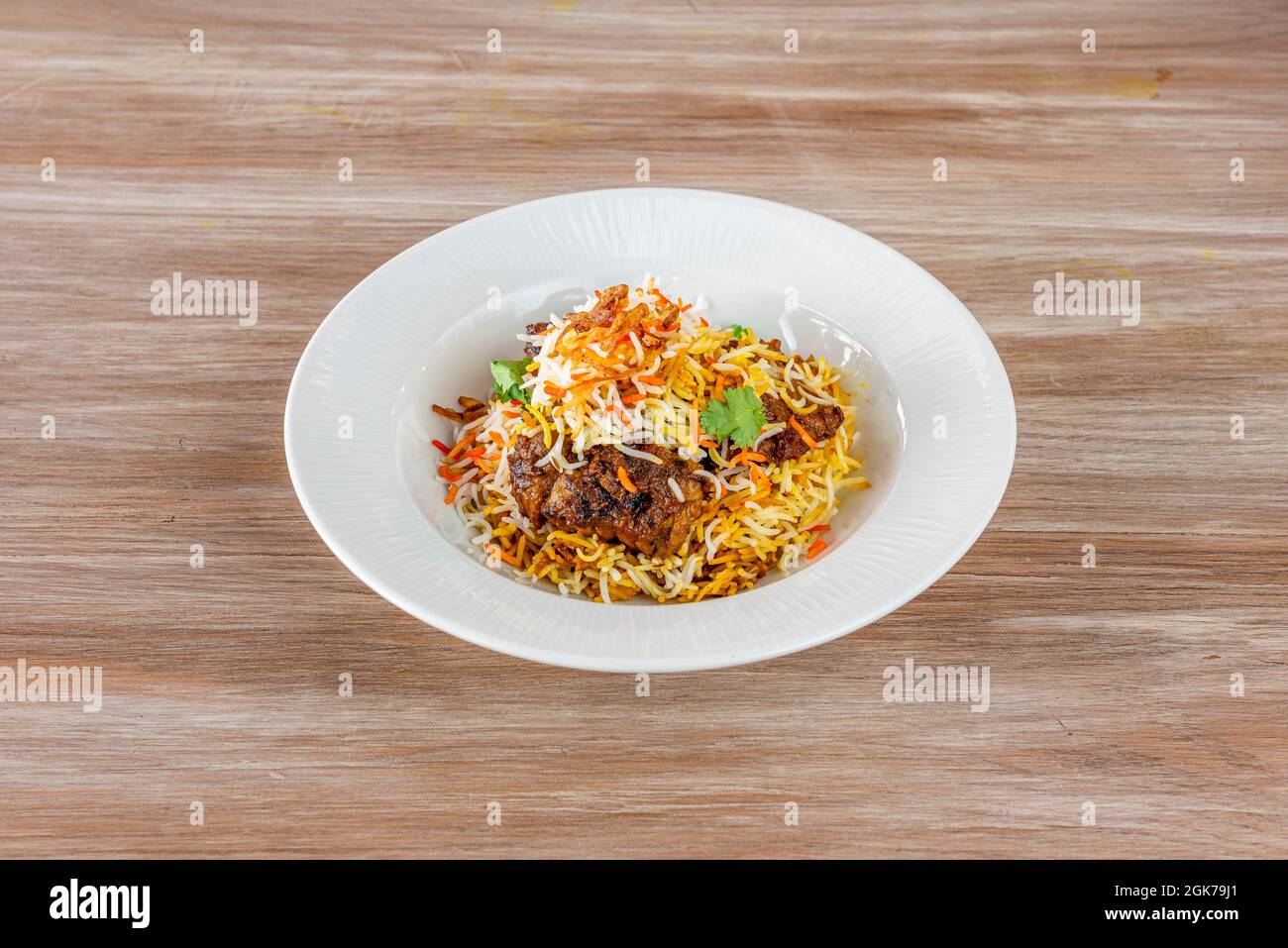 Biryani rice recipe with stewed lamb meat cooked in a Pakistani ...