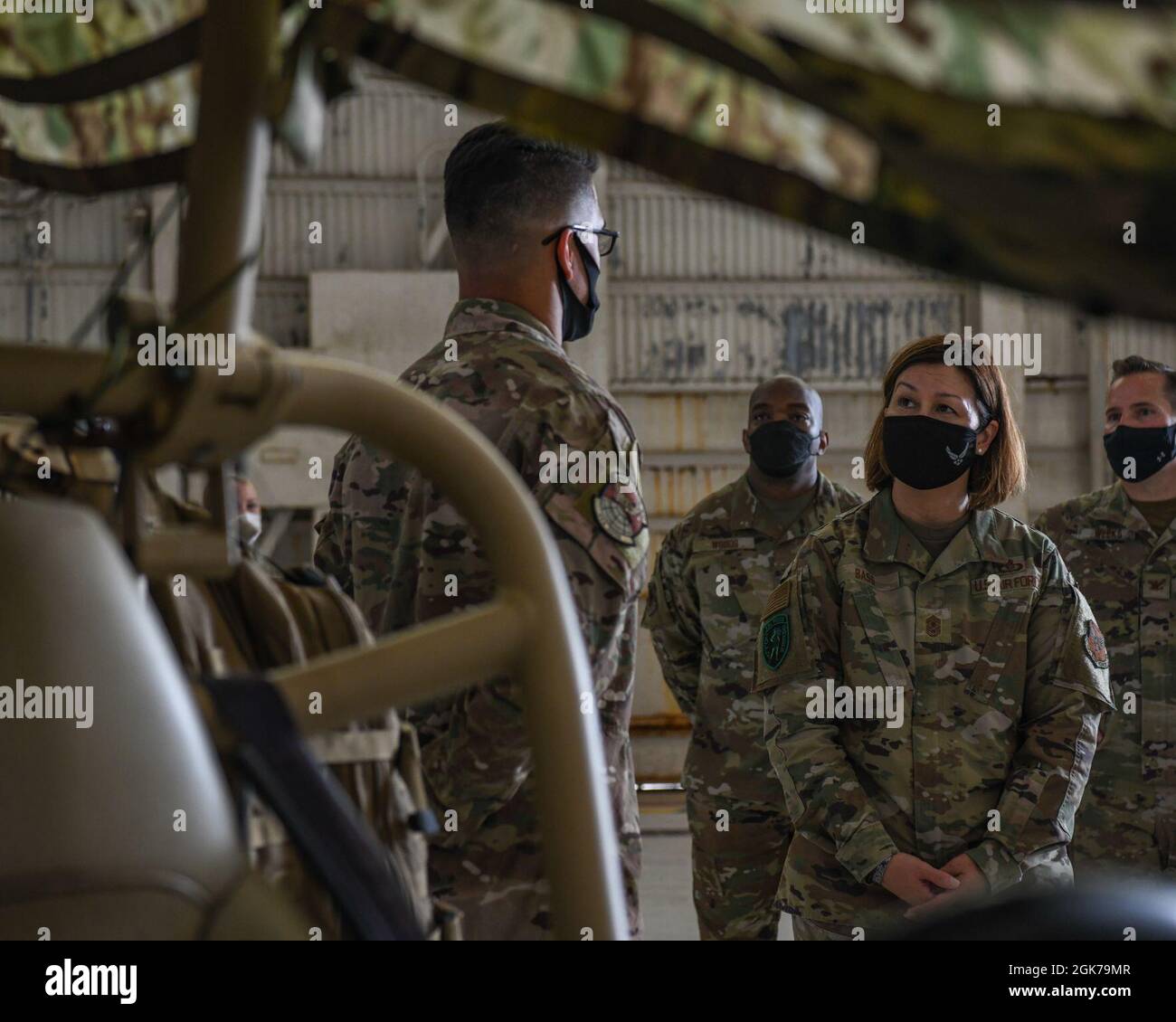 Chief Master Sgt. of the Air Force JoAnne S. Bass listens to a 353rd Special Operations Wing ...
