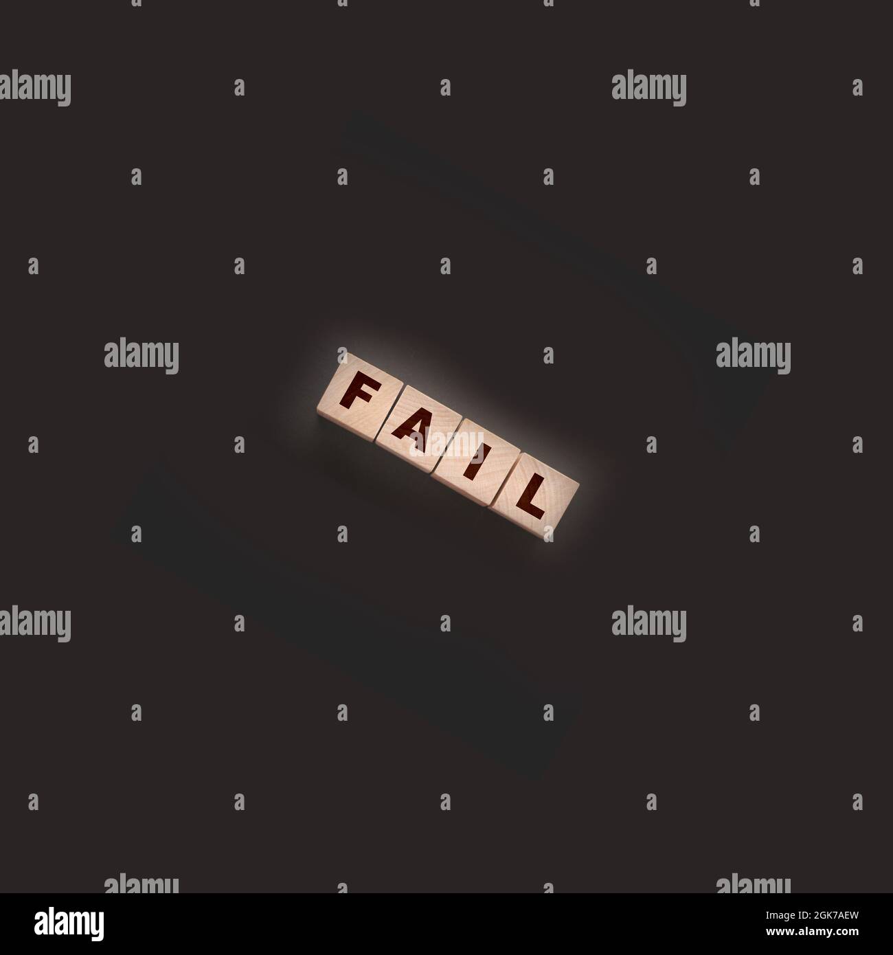 FAIL Word text Written In Wooden Cube blocks on black background ...