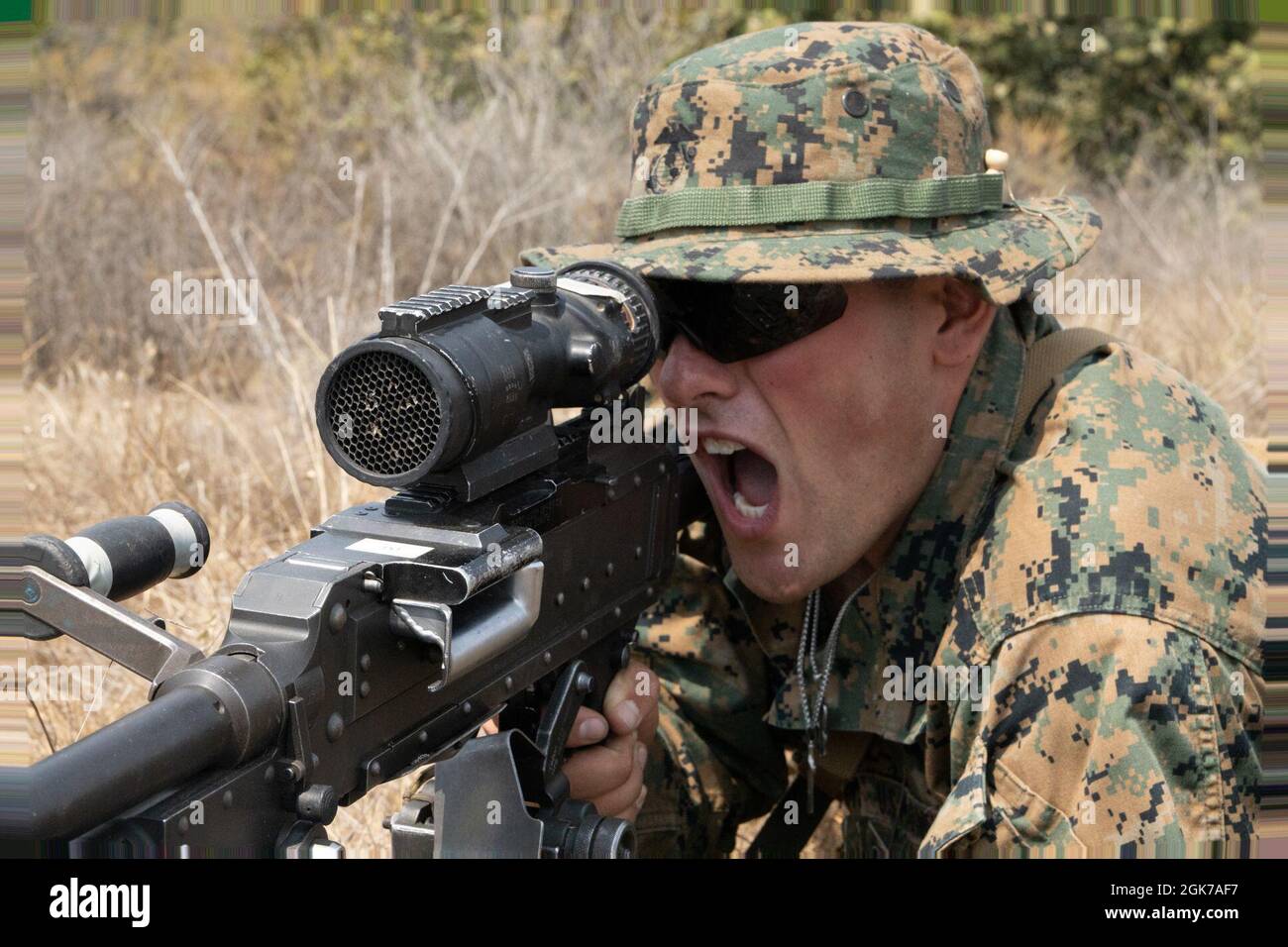 U.S. Marine Corps Pfc. Griffin Dodge, a machine gunner 1st Battalion ...