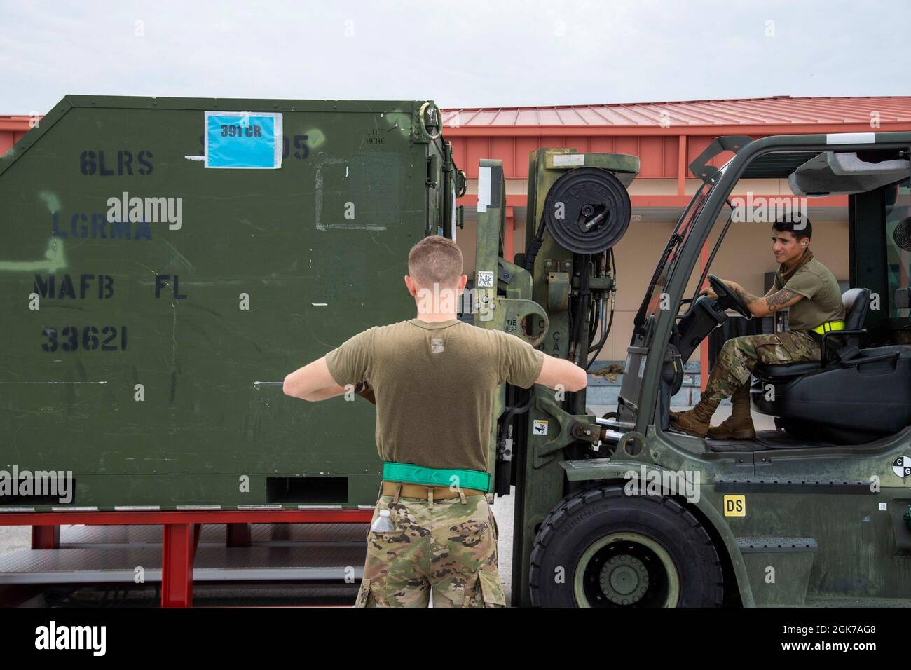 Airmen from the 6th Logistics Readiness Squadron load gear during a ...