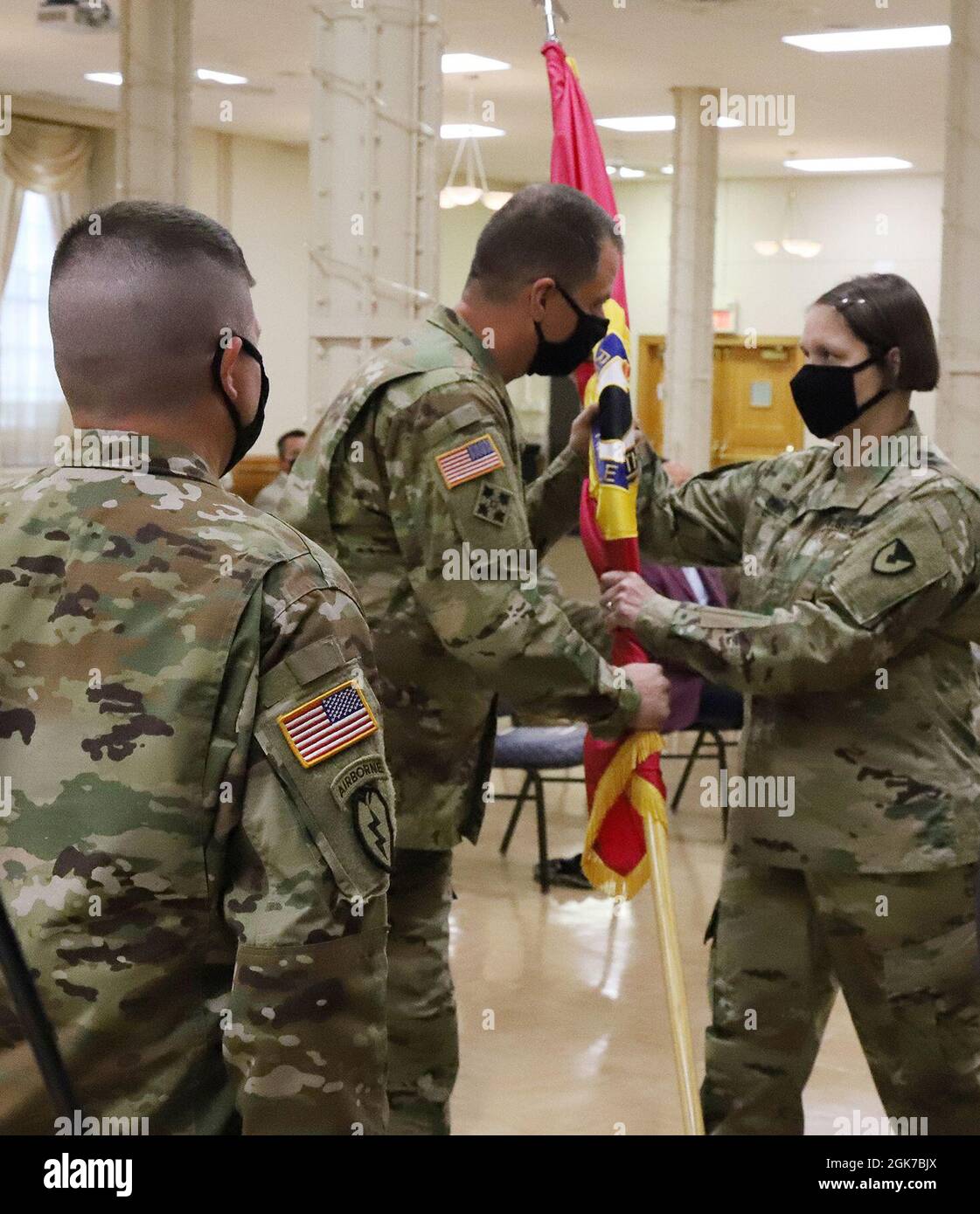 Command Sgt. Maj. Petra Casarez (right) accepts the Joint Munitions ...