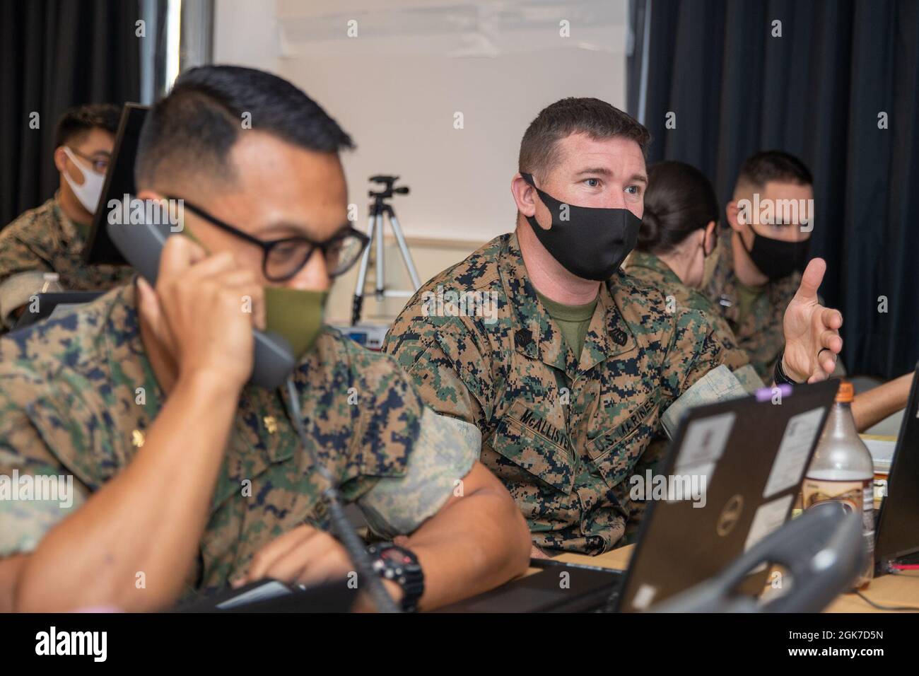 U.S. Marines with 3rd Marine Expeditionary Brigade conduct a command ...