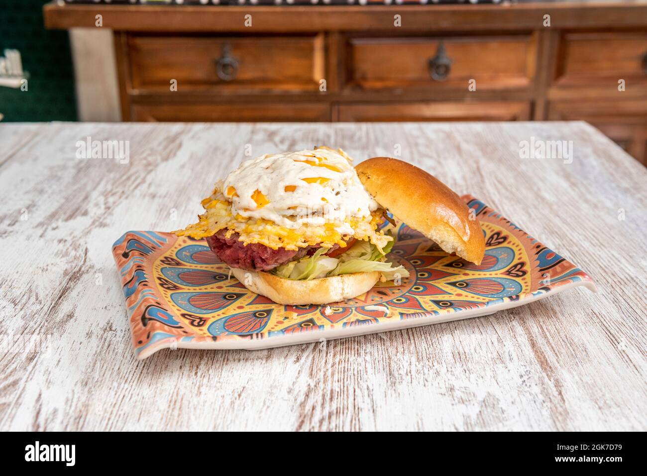 Great undercooked burger with fried egg, cream cheese, crispy cheddar ...