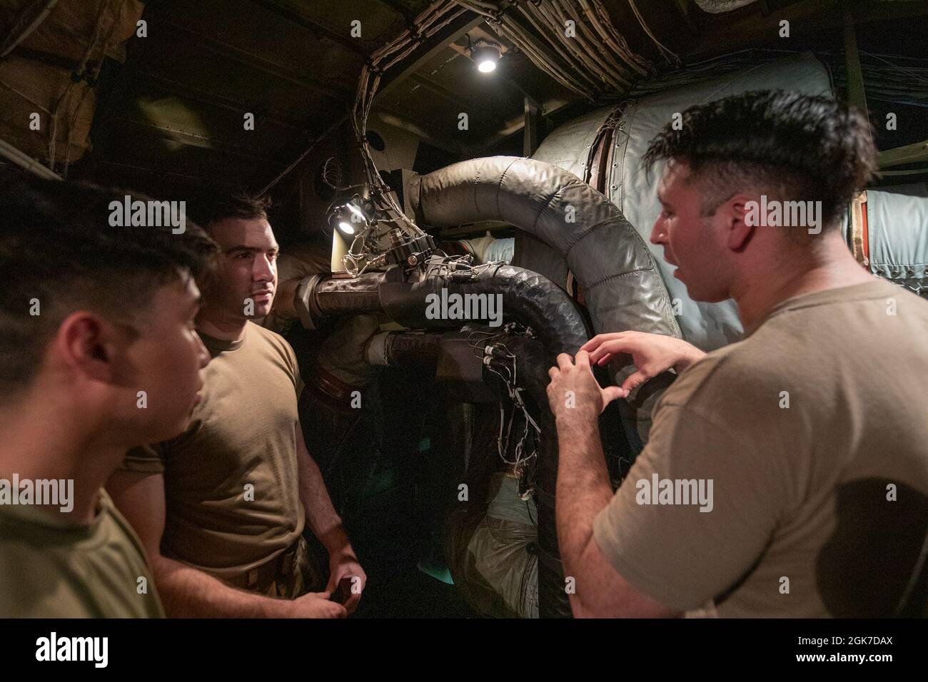 Staff Sgt. Adrian Diaz Jr., right, 730th Air Mobility Squadron engine ...