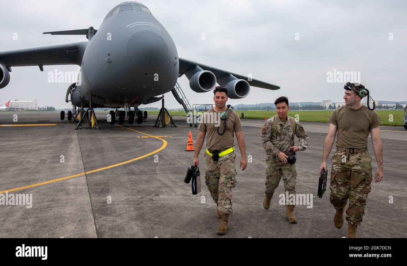 Left to right, Staff Sgt. Adrian Diaz Jr., 730th Air Mobility Squadron ...