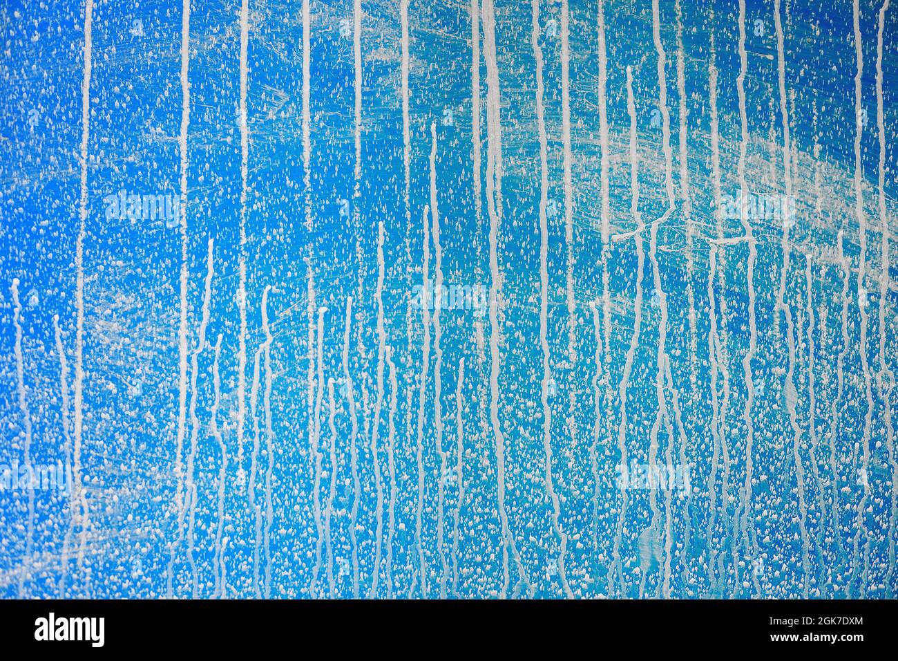 Abstract blue background. Empty surface. Traces or splashes from water ...