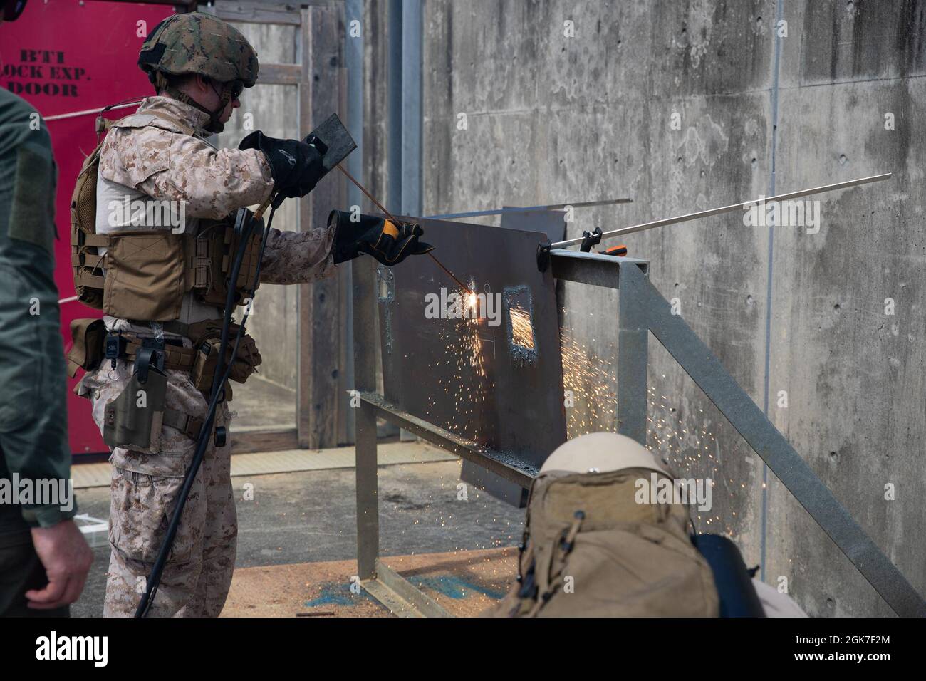 A U.S. Marine Corps Explosive Ordinance Disposal Technician, currently ...