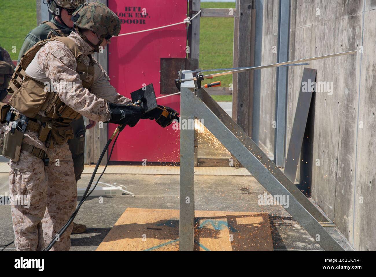 A U.S. Marine Corps Explosive Ordinance Disposal Technician, currently ...