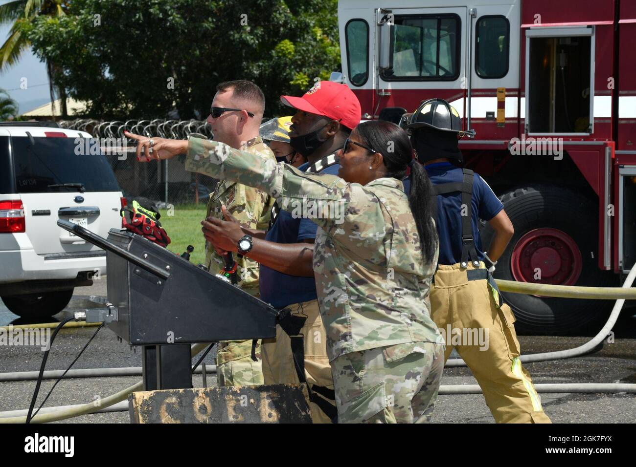 U.S. Air Force firefighters with the 612th Air Base Squadron, conduct ...