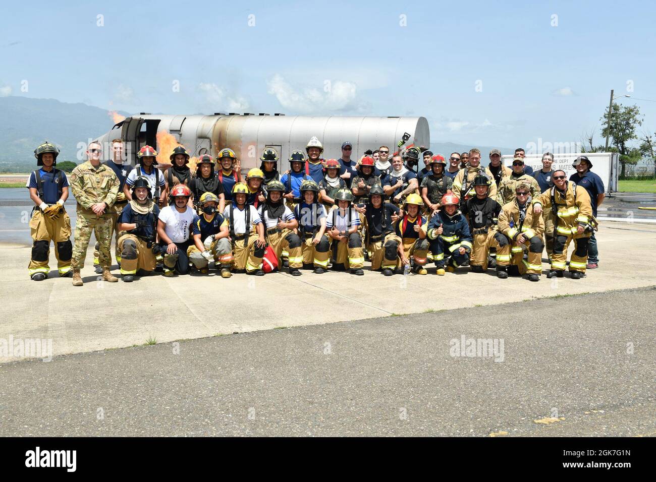 U.S. Air Force firefighters with the 612th Air Base Squadron, pose for ...