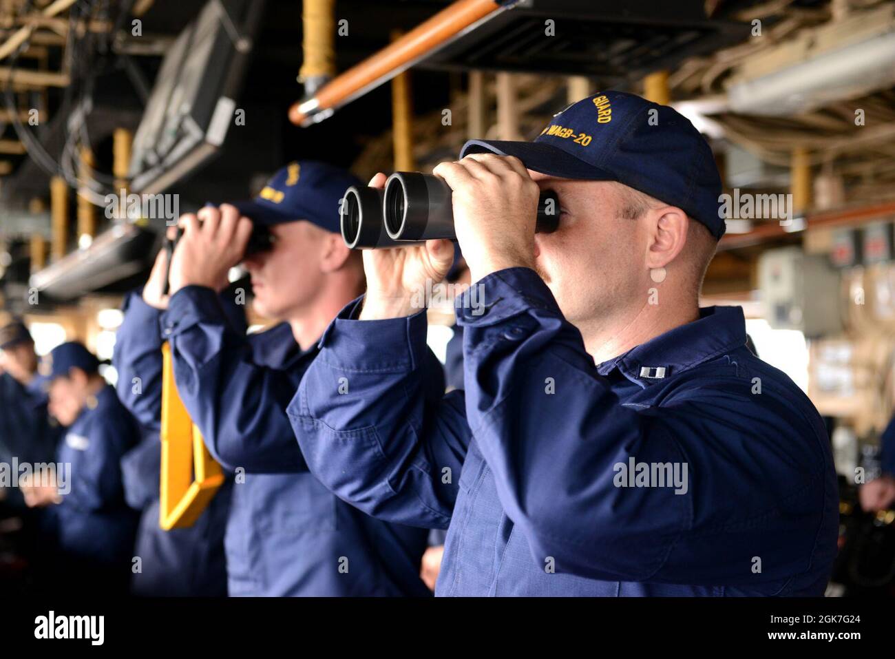 Lt. Kevin Lowery and ENS Ryan Dunkle scan for other vessels and ...