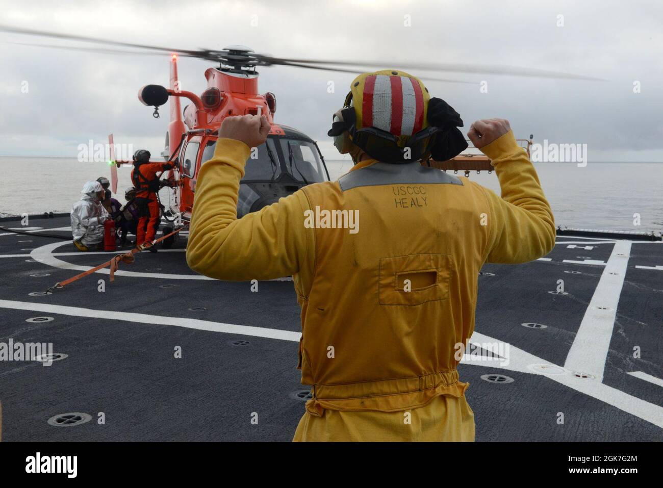 Ens. Ryan Dunkle, a Coast Guard Cutter Healy (WAGB 20) crewmember ...