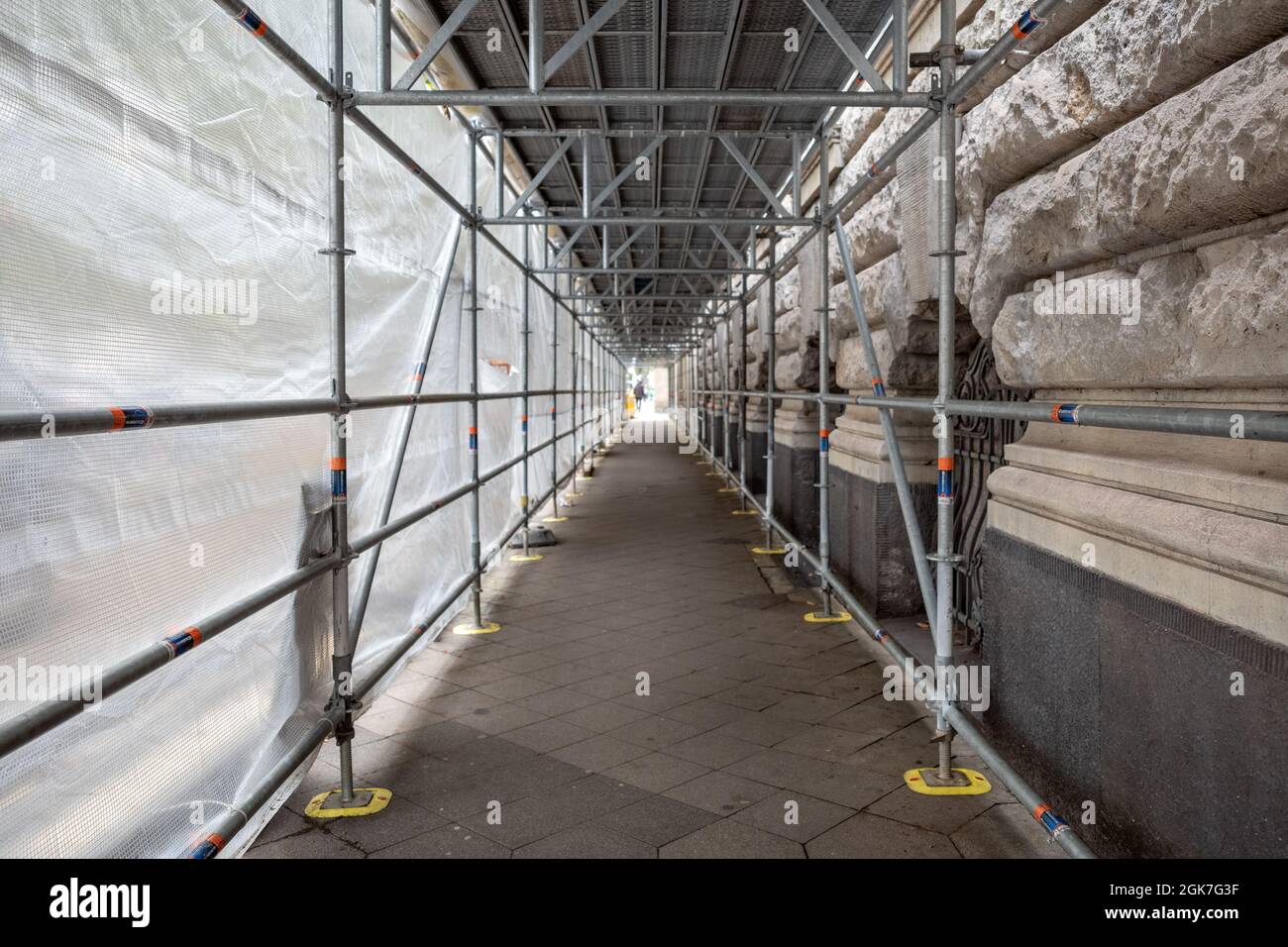 Diminishing perspective view of walkway tunnel and selected focus at ...