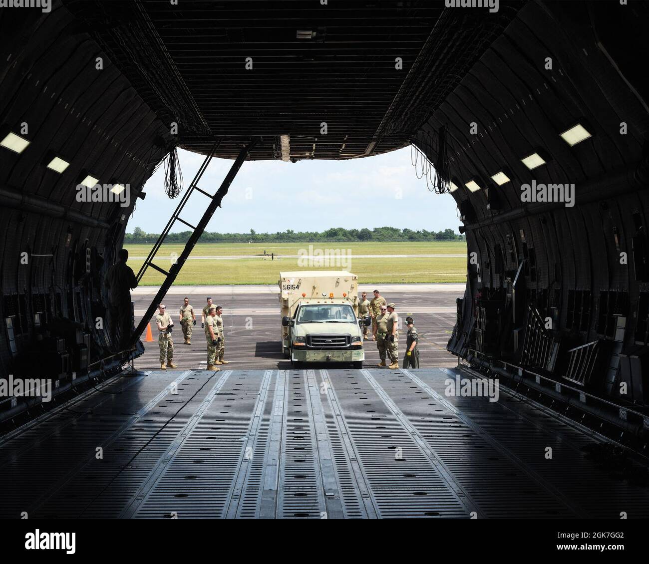 Members of the 147th Attack Wing prepare to load a ground control ...