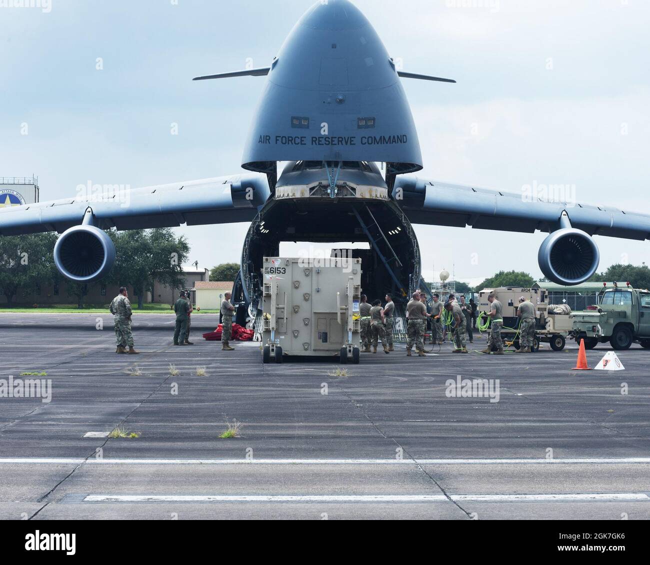 Members of the 147th Attack Wing prepare to load a ground control ...