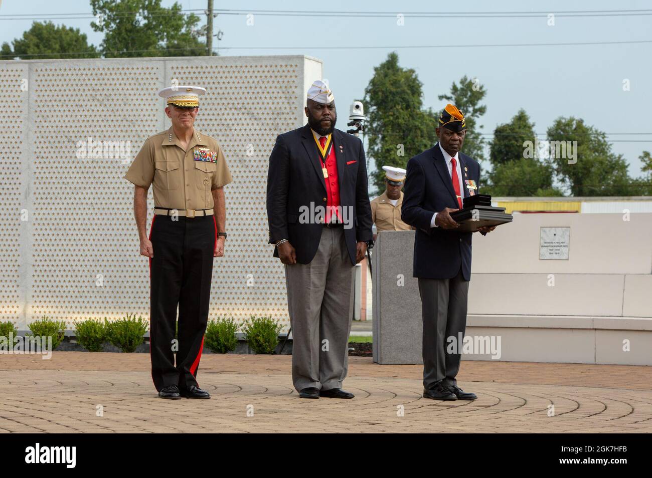 U.S. Marine Corps Commandant Gen. David H. Berger, left, James T ...