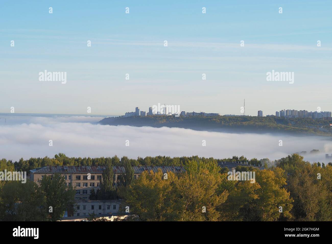 Morning fog over the city and the river Stock Photo - Alamy