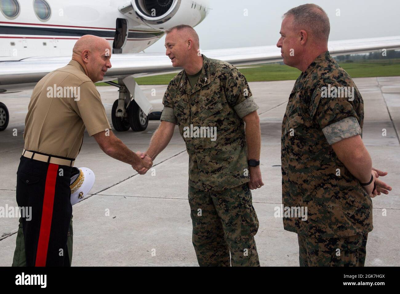 U.S. Marine Corps Gen. David H. Berger, left, the commandant of the ...