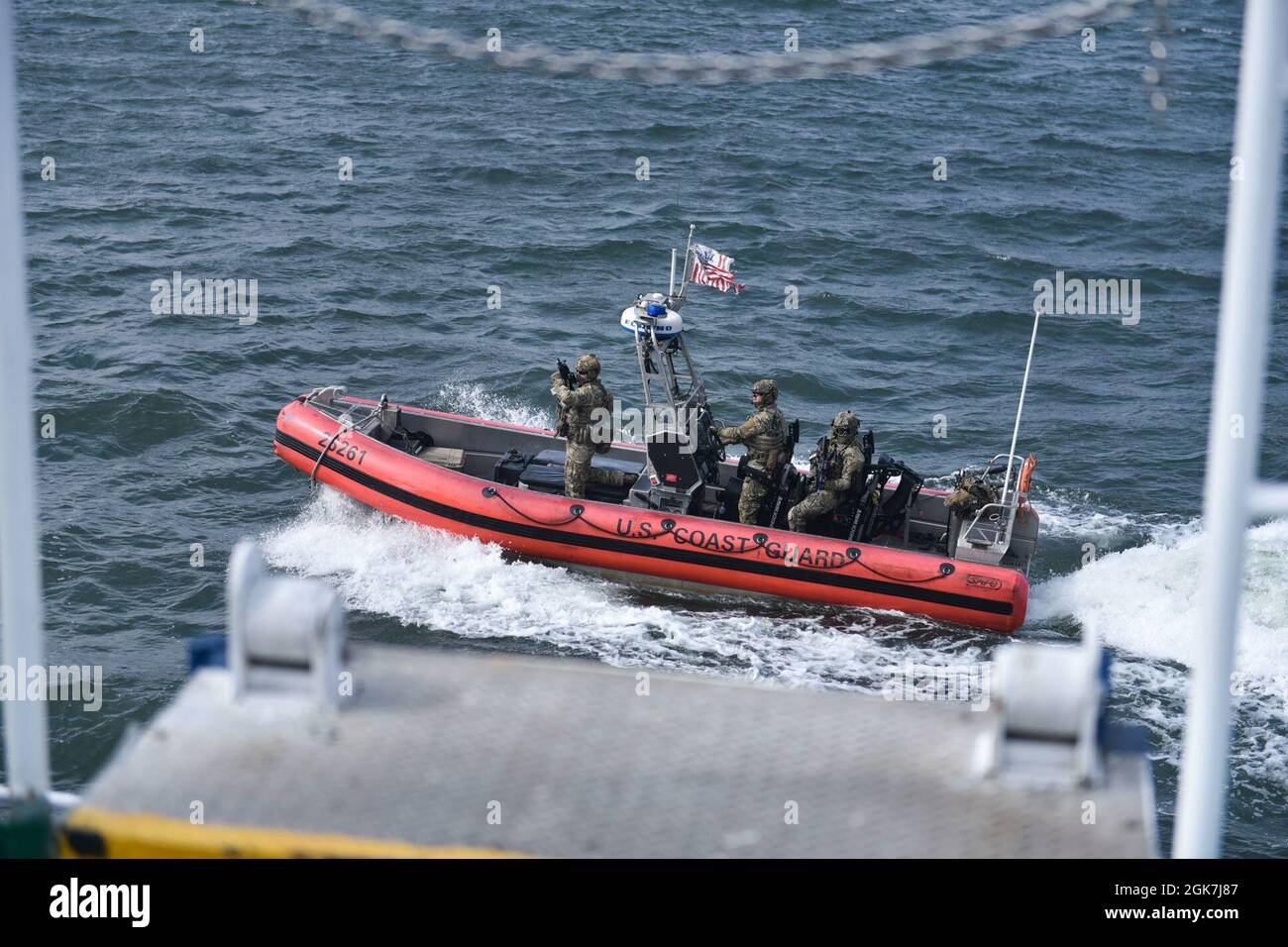 U.S. Coast Guard Maritime Security Response Team West members patrol a ...