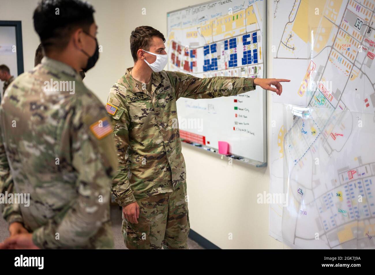 Sgt. Korbein Shultz, right, an intelligence analyst assigned to Task ...