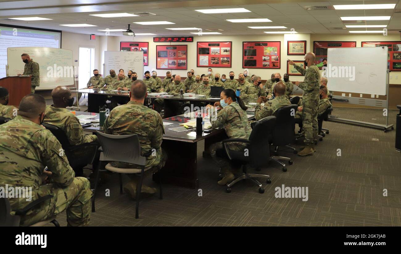 Col. Kevin W. Agness, along with Command Sgt. Maj. Phillip C ...