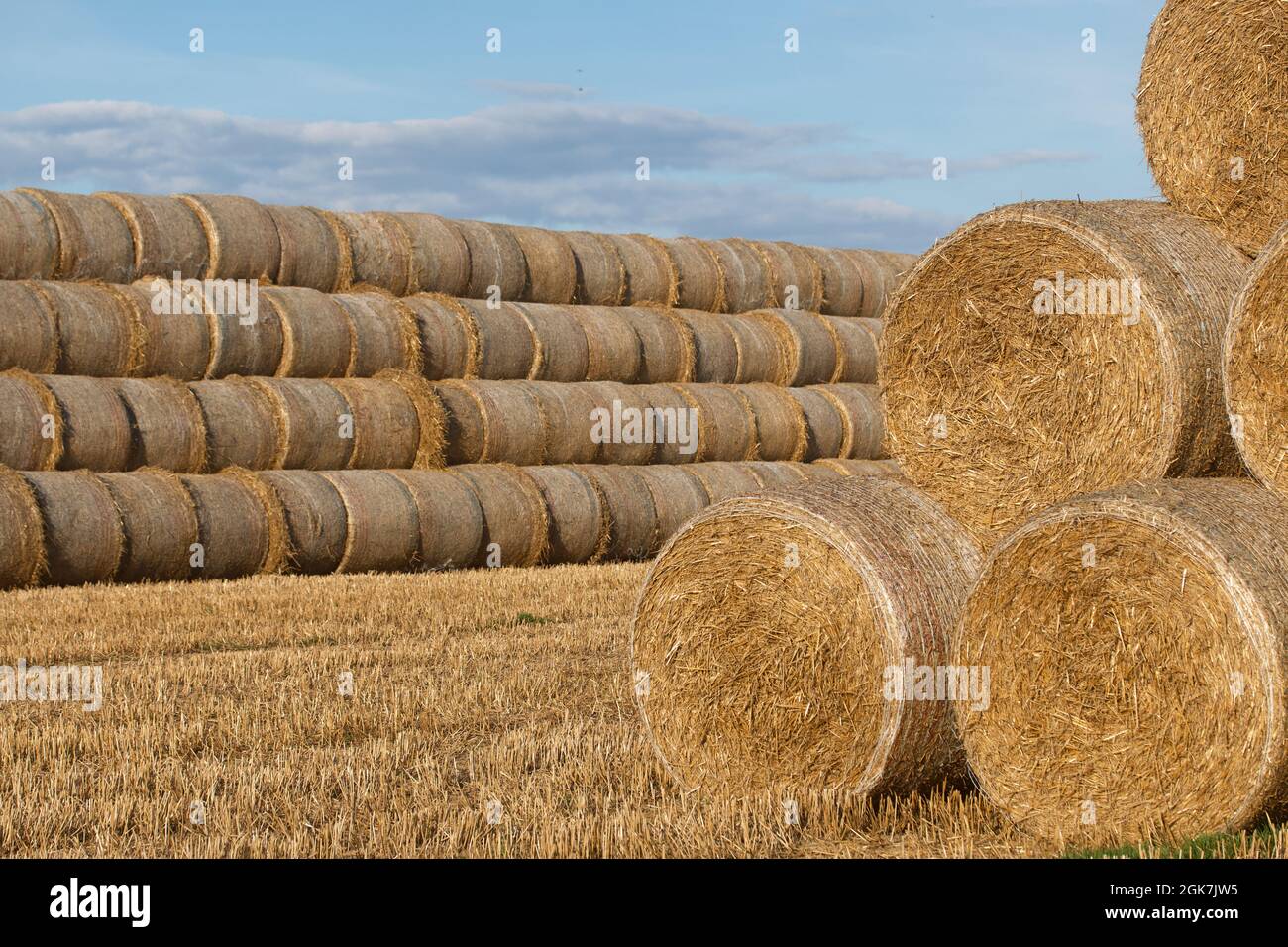 Straw rolls, stacked in a pyramid. Close-up shot Stock Photo - Alamy